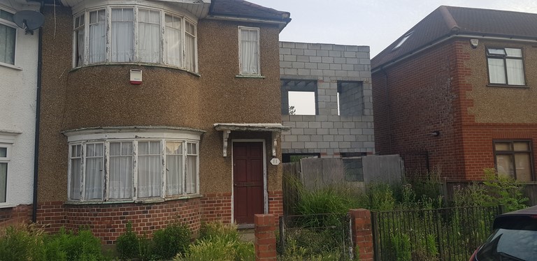 Three storey extension on two storey house in Ruislip