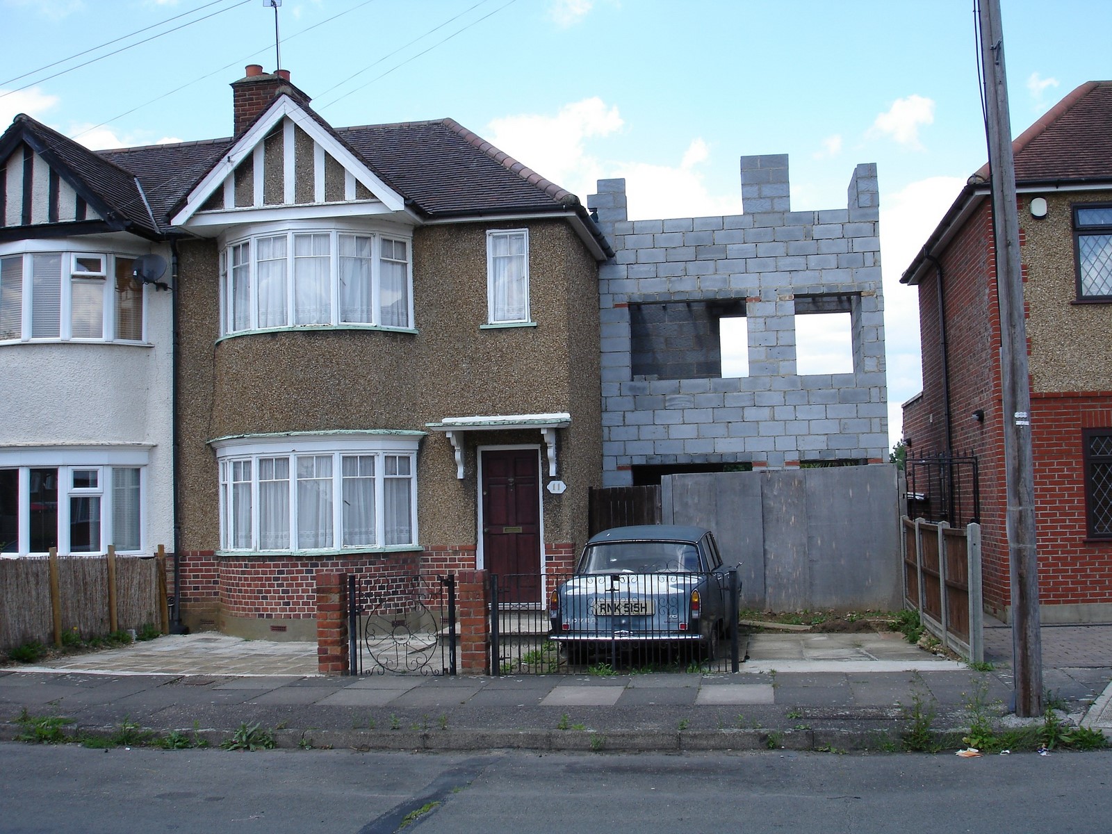 The three storey extension on two storey house in Ruislip